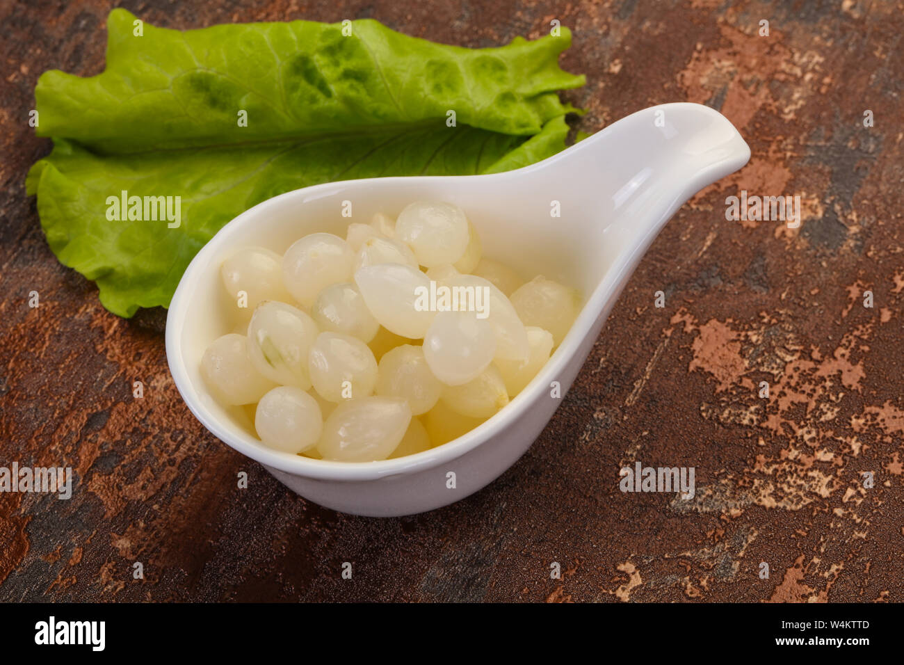 Pickled baby onion in the bowl Stock Photo - Alamy