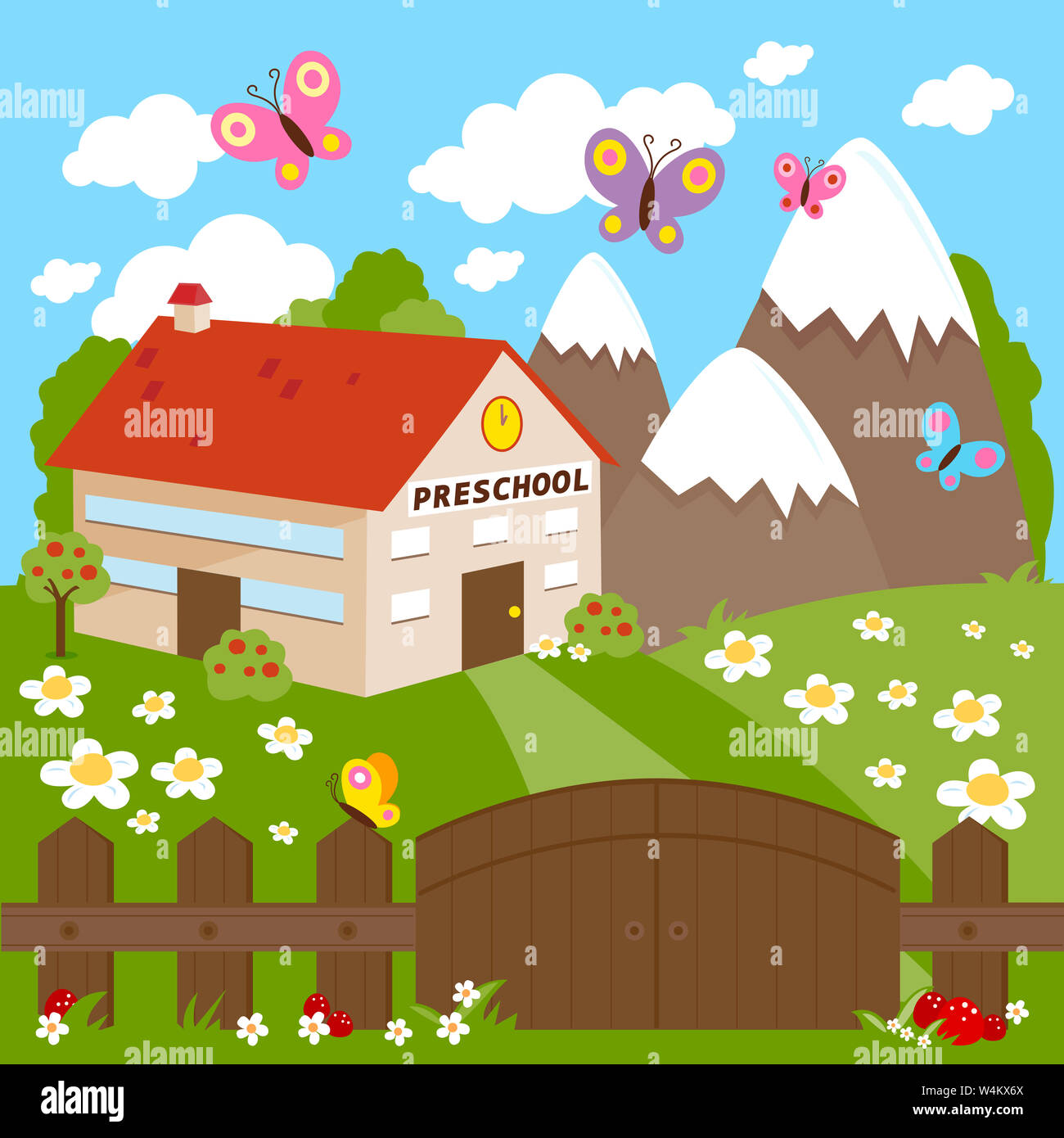 Preschool building, meadow and wooden fence Stock Photo - Alamy