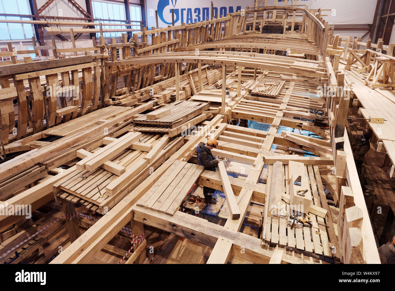 People working on reconstruction of the first Russian ship of the line ...