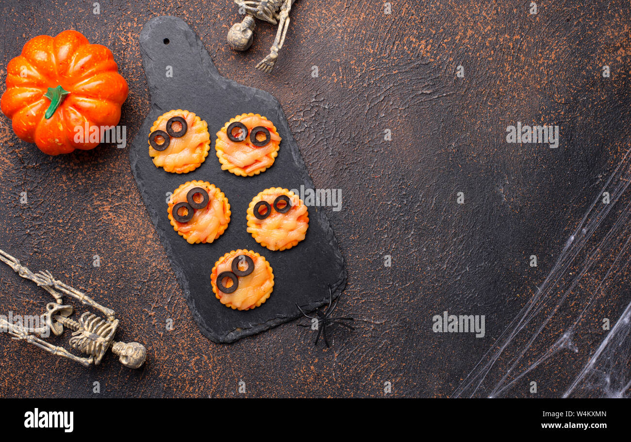Halloween scary mini mummy pizza Stock Photo - Alamy