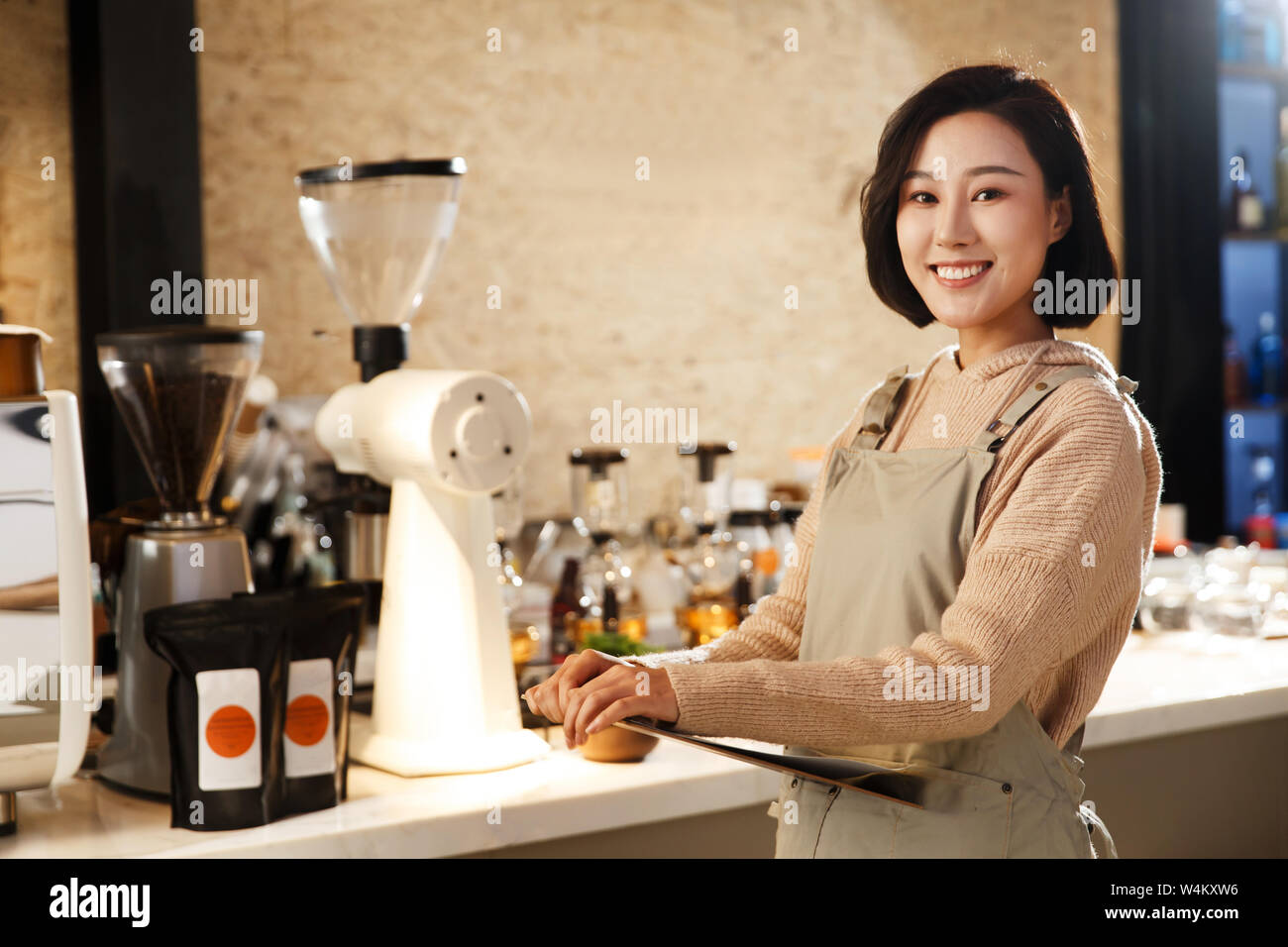 Coffee shop attendant Stock Photo - Alamy