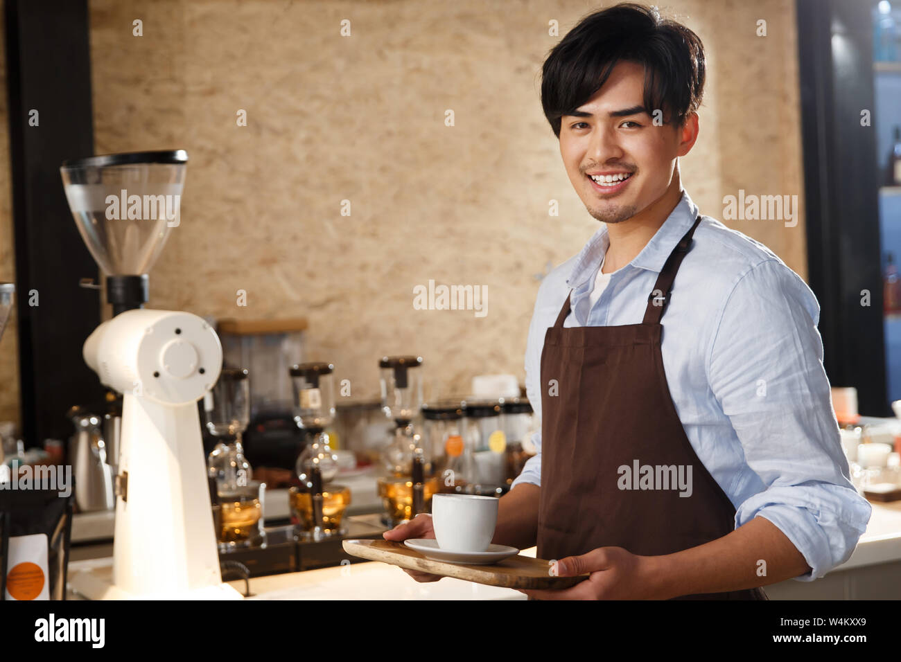 Coffee shop attendant Stock Photo - Alamy
