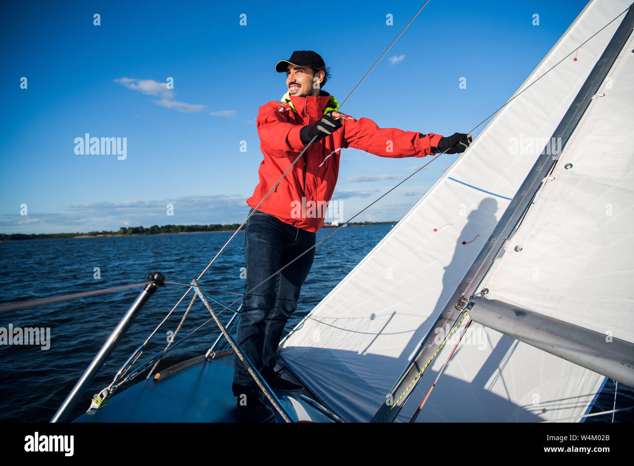 Sailing team operating windlass hi-res stock photography and images - Alamy