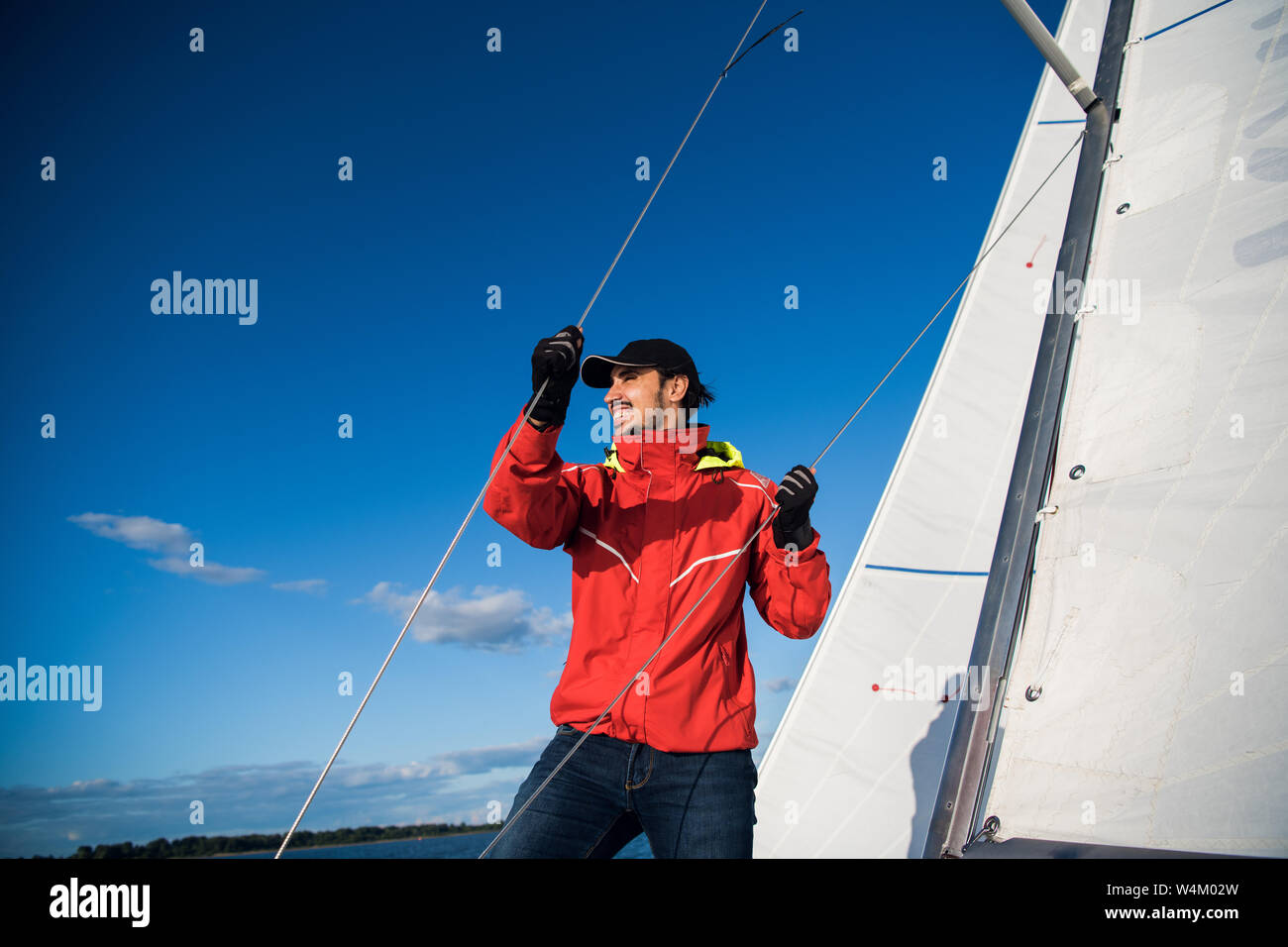 Sailing team operating windlass hi-res stock photography and images - Alamy