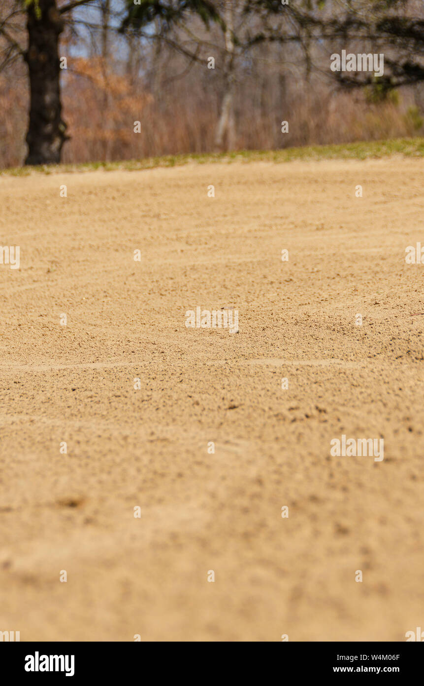 A sand trap, sand hazard, bunker in a golf course. A golf hazard Stock ...