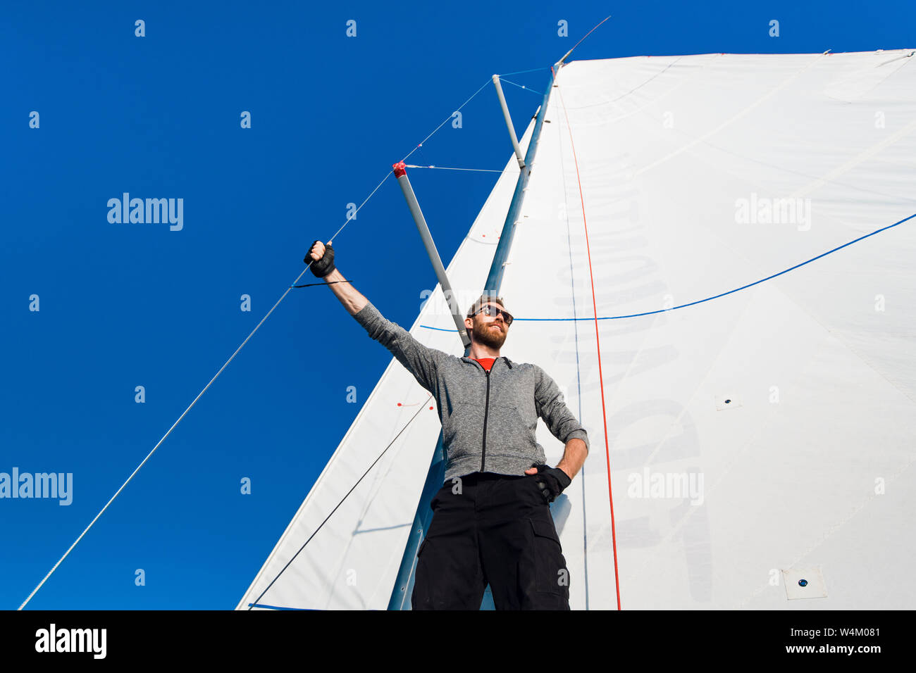 Sailing team operating windlass hi-res stock photography and images - Alamy