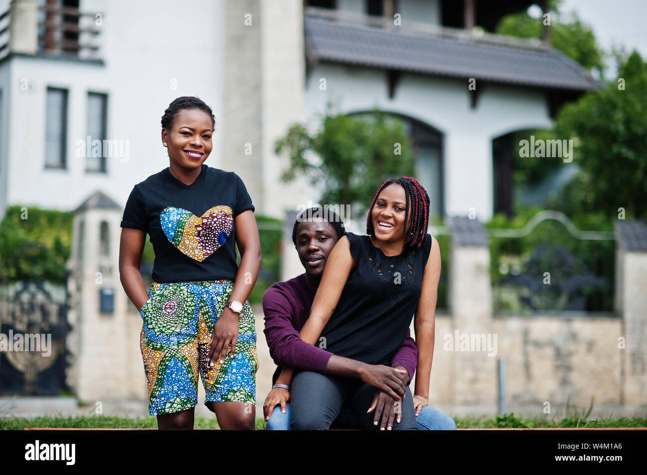 Three african american friends posed outdoor together Stock Photo - Alamy