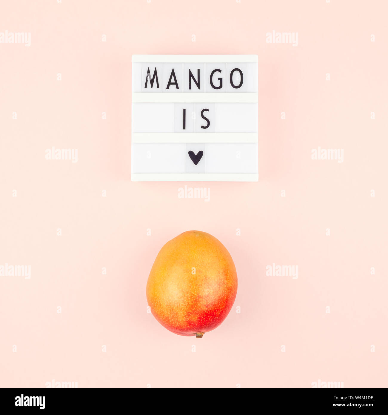 Mango fruit in creative conceptual top view flat lay composition with ...