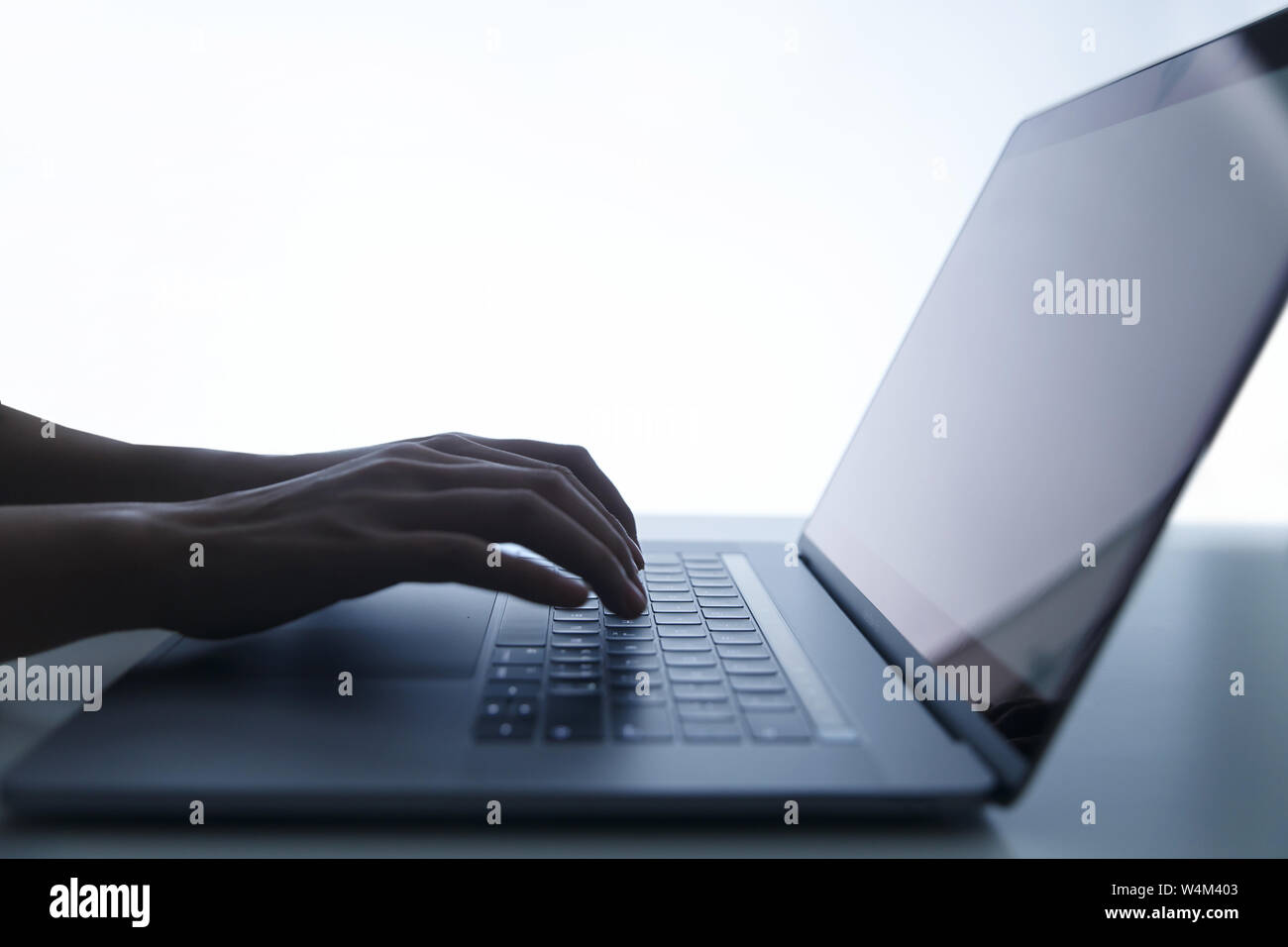 Woman pointing laptop screen close hi-res stock photography and images ...