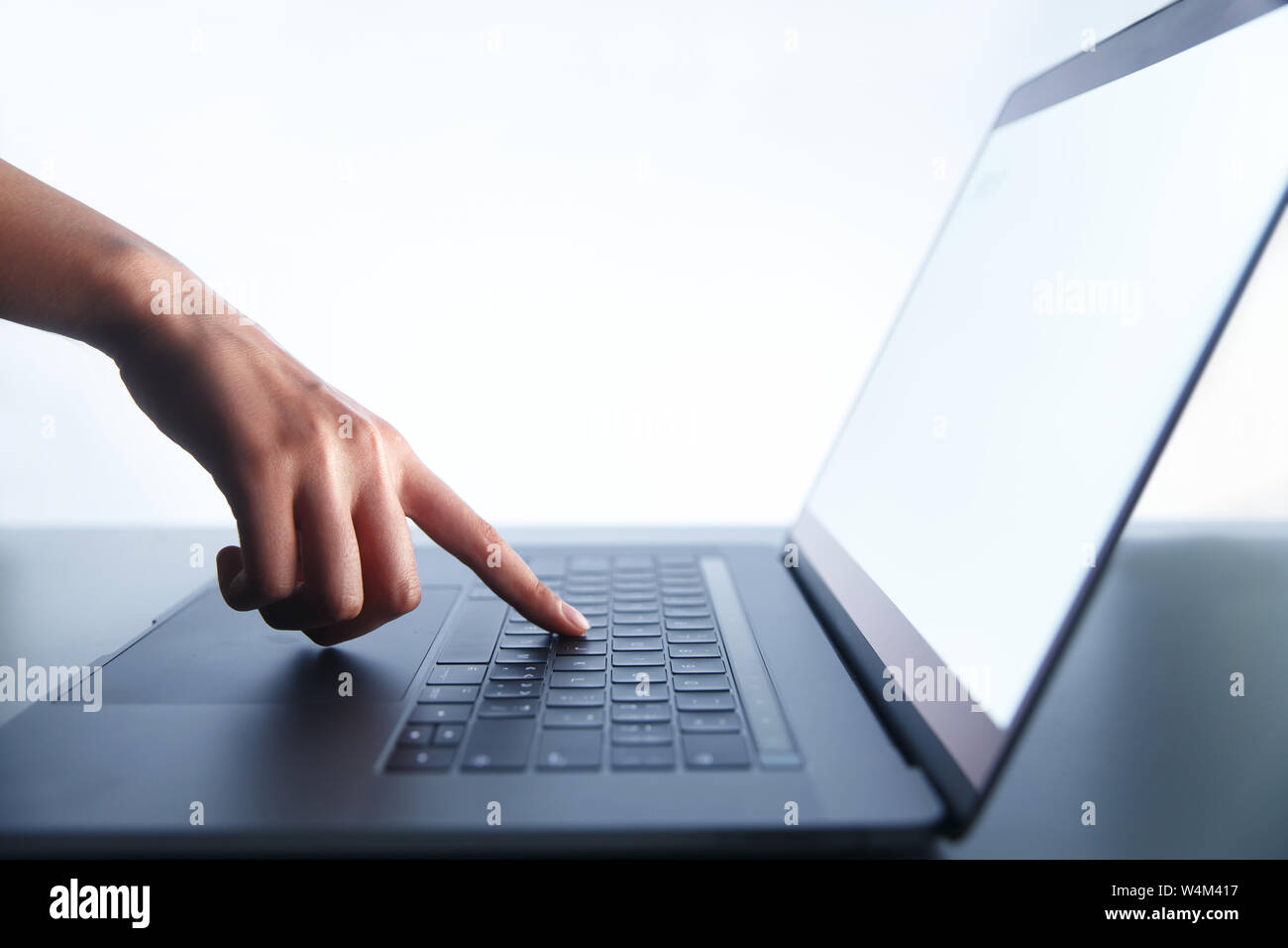 Use your laptop Stock Photo - Alamy