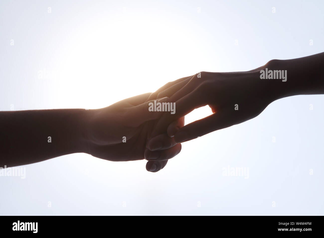Hand in hand Stock Photo - Alamy
