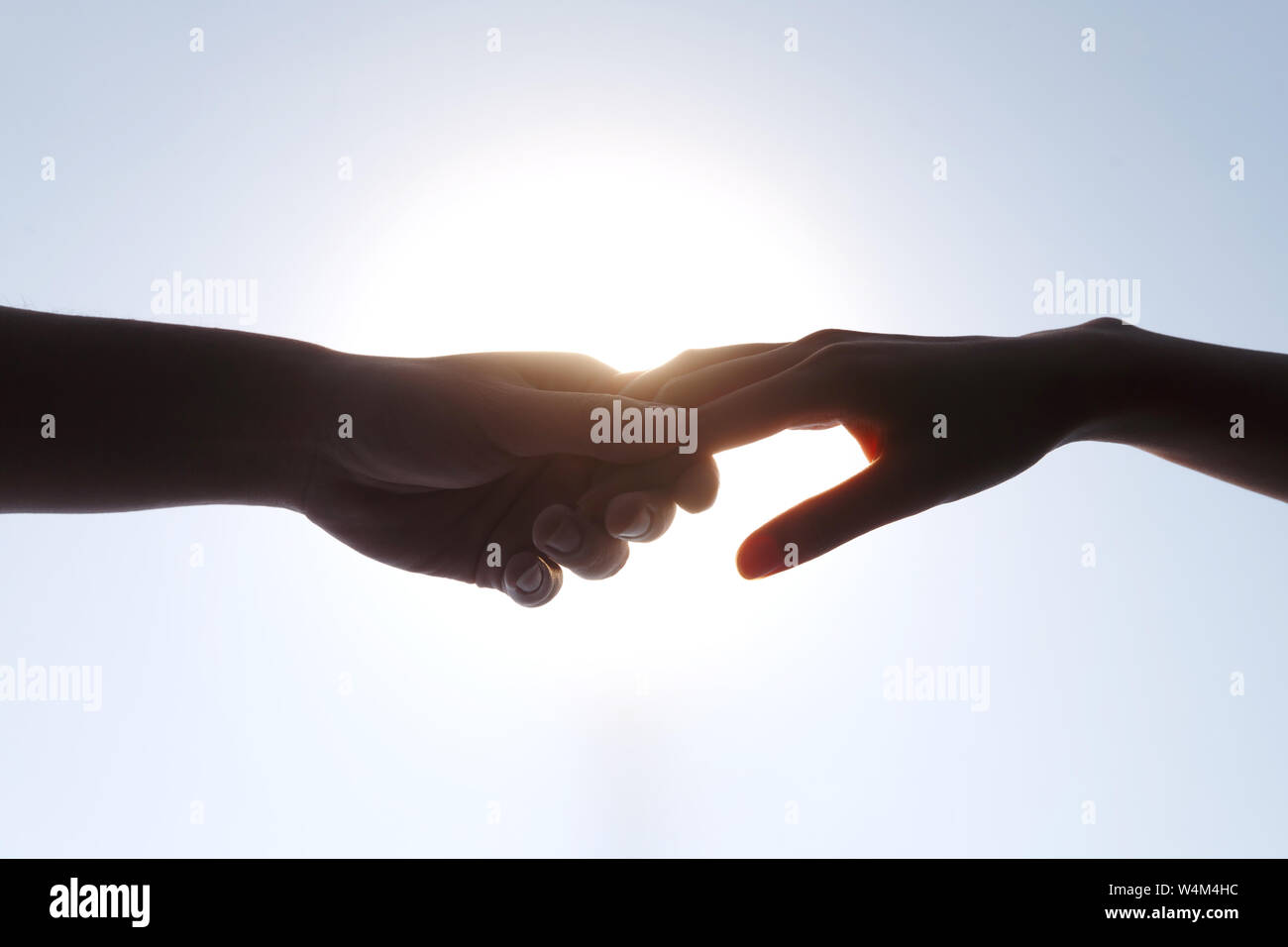 Hand in hand Stock Photo - Alamy