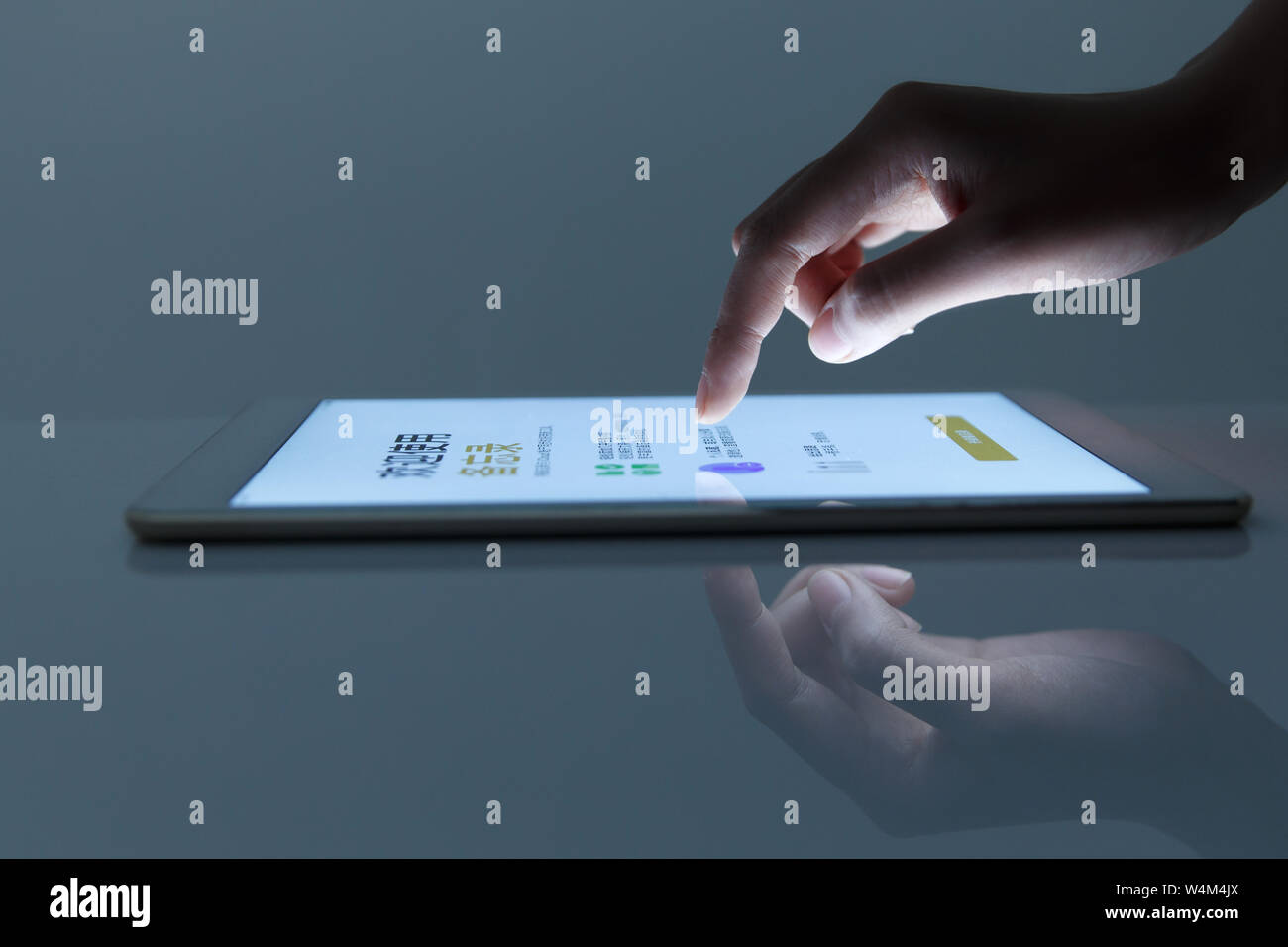 Use the tablet Stock Photo - Alamy