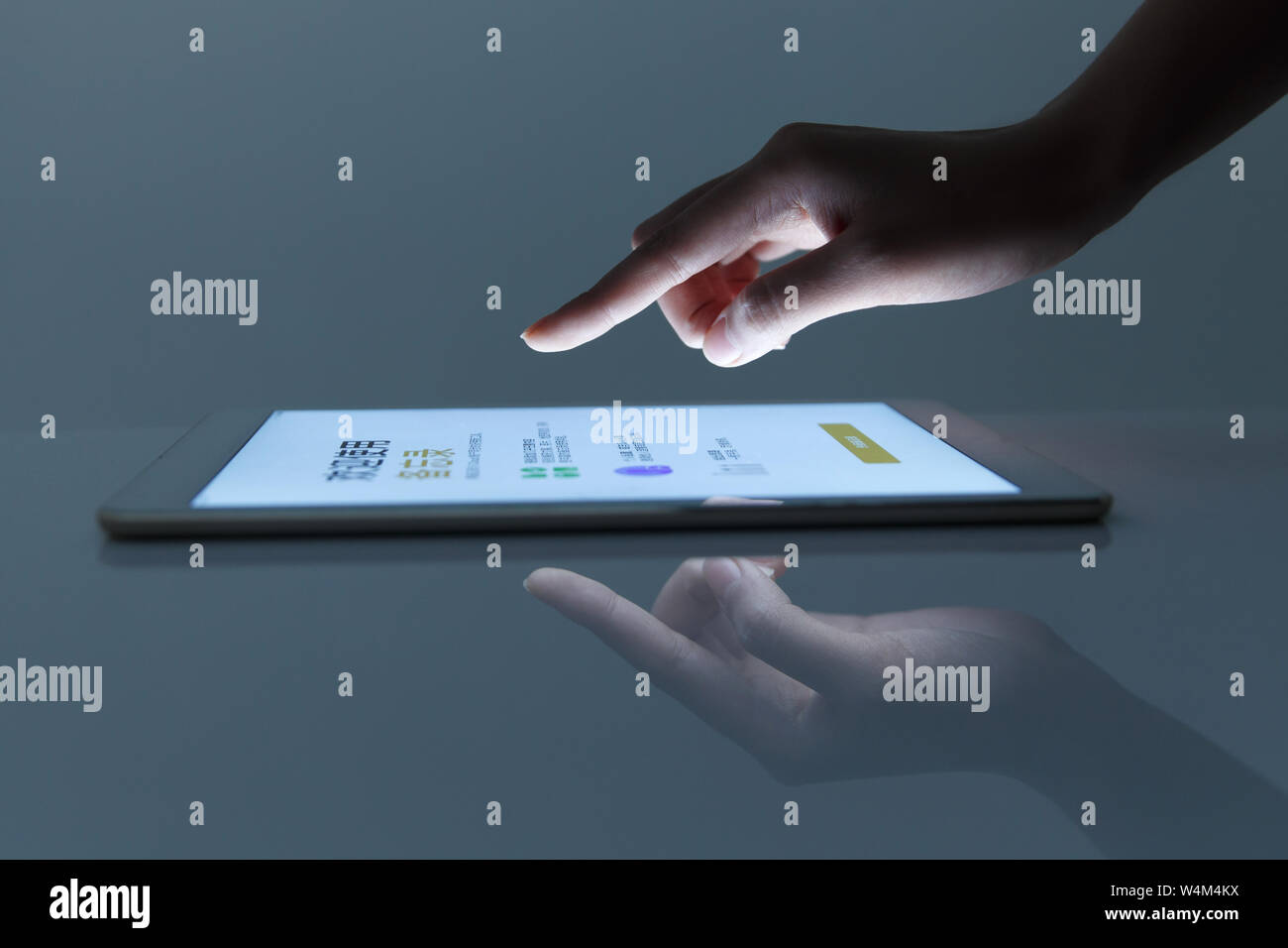 Use the tablet Stock Photo - Alamy