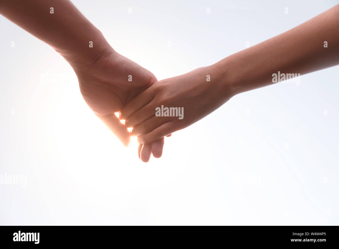 Hand in hand Stock Photo - Alamy