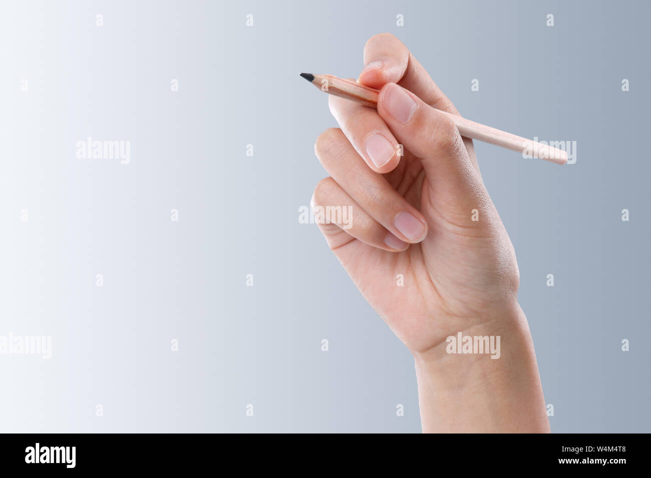 Take a pencil Stock Photo - Alamy