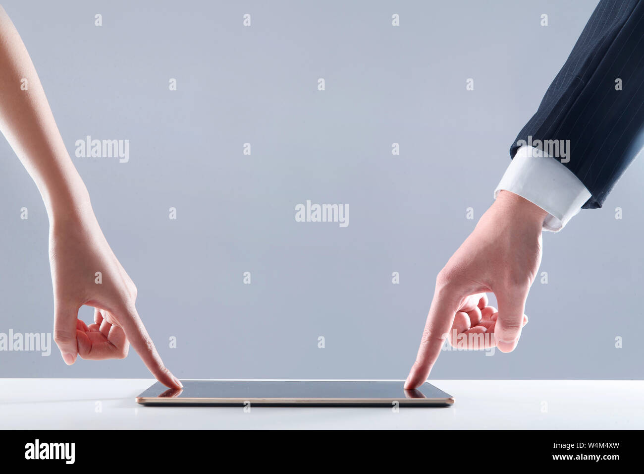 Use the tablet Stock Photo - Alamy
