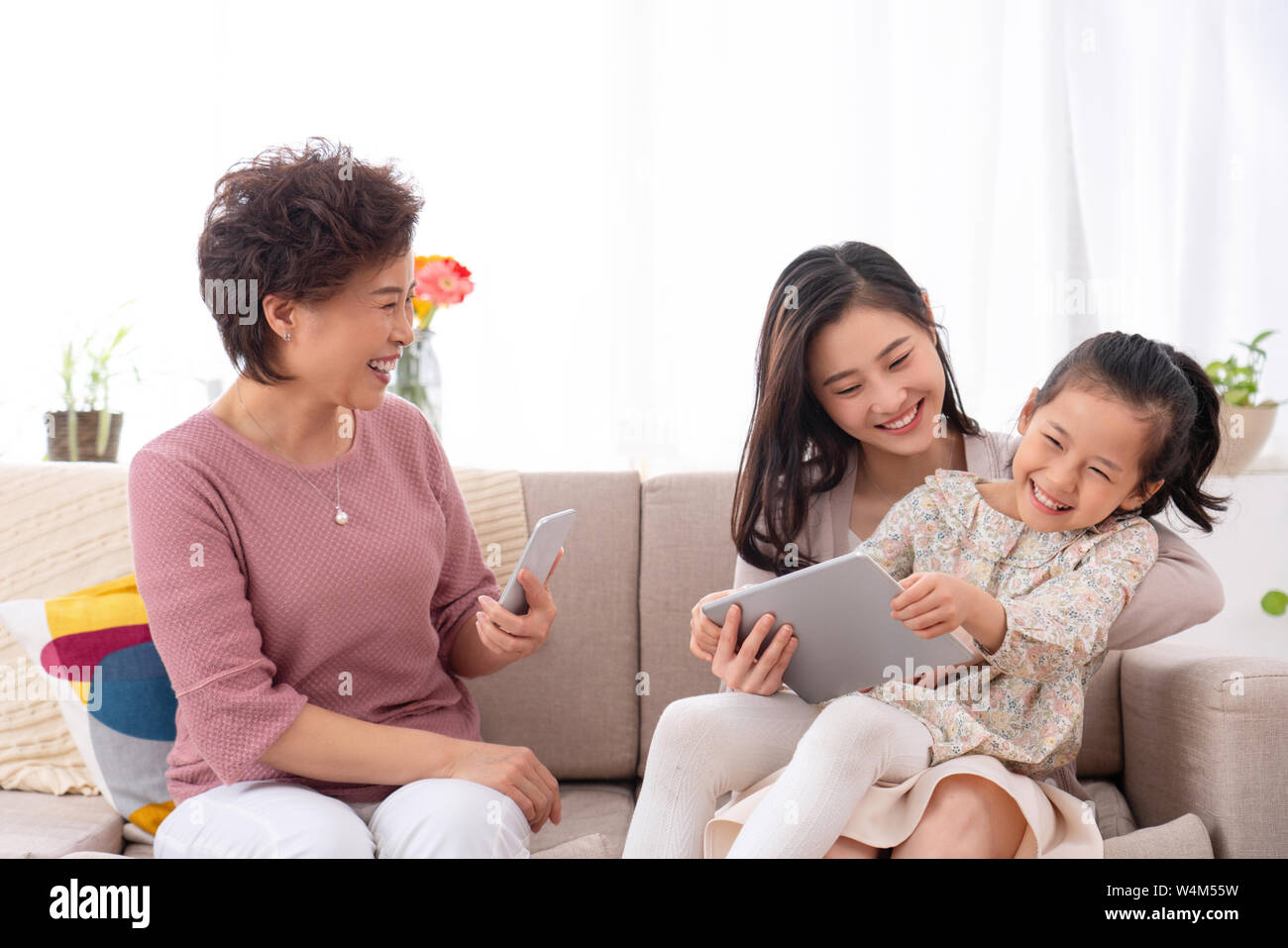 Happy three generations Stock Photo - Alamy