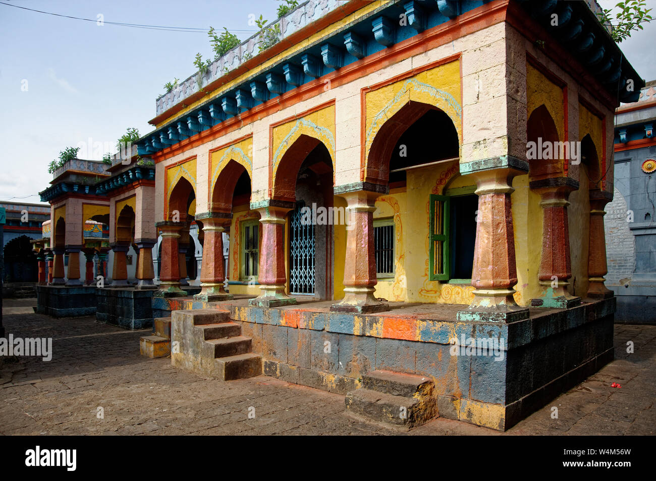Colorful small shrines of Hindu god and goddesses in the complex Stock ...