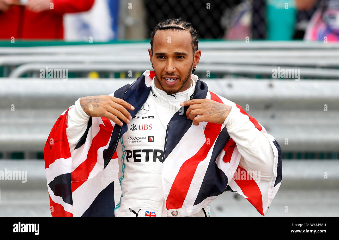 Mercedes driver Lewis Hamilton celebrates winning the British Grand ...