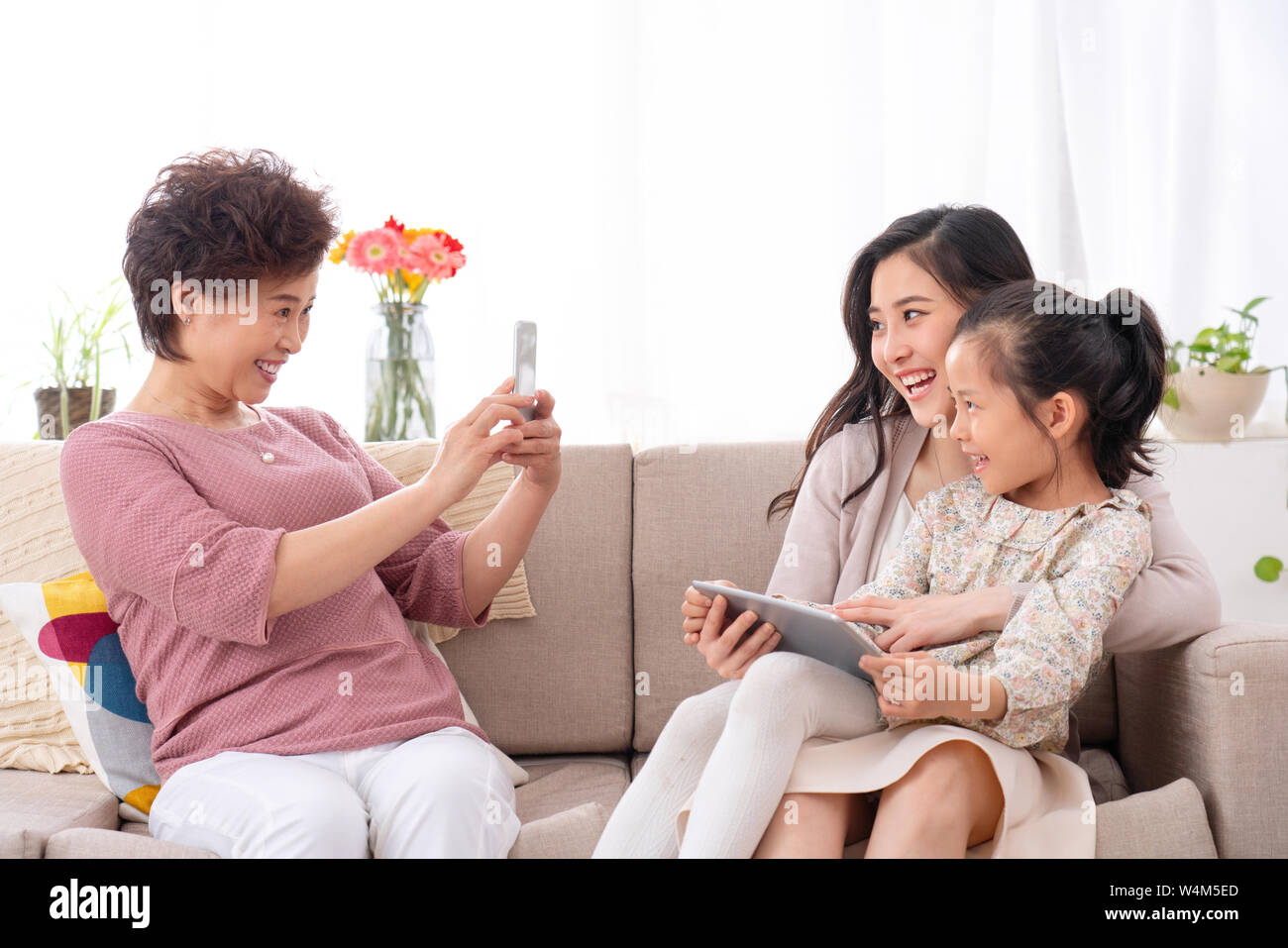 Happy three generations Stock Photo - Alamy