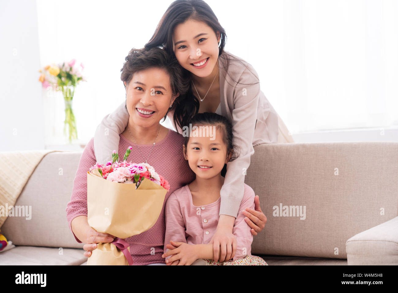 Happy three generations Stock Photo - Alamy