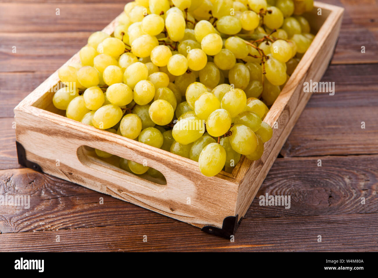 Photo of green grapes in wooden box Stock Photo - Alamy