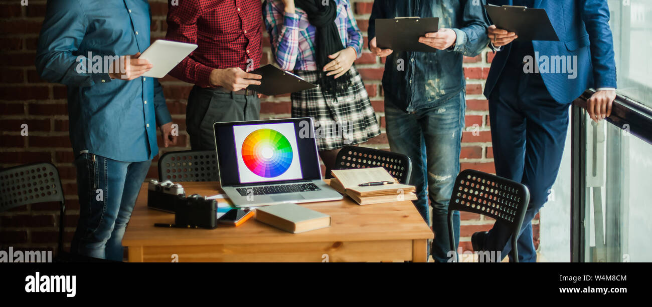 open laptop computer with a color palette in workplace designer in the ...