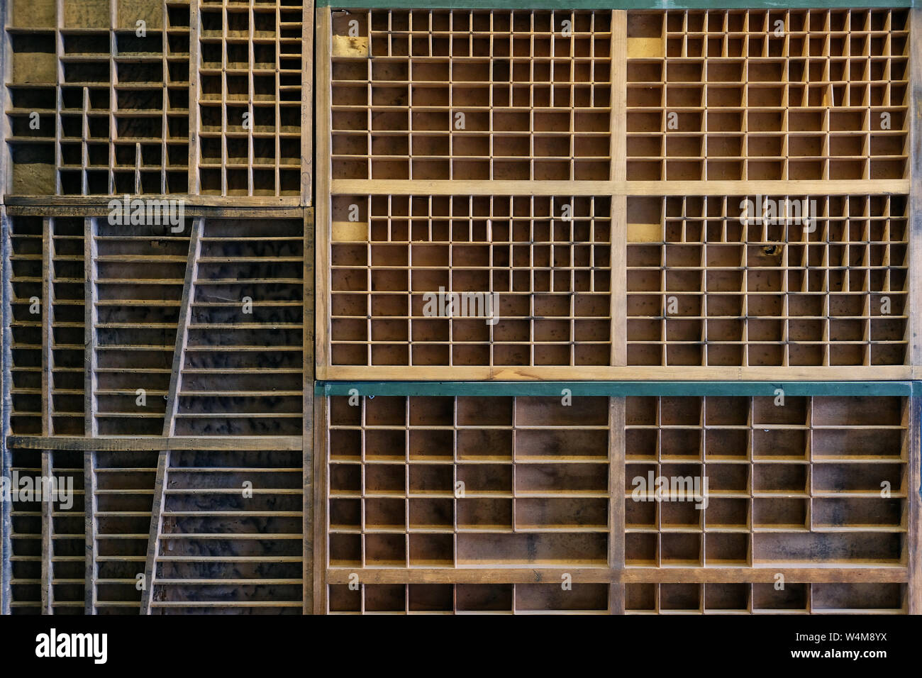 Set case. Close-up of old typesetting boxes on the facade of a paper ...