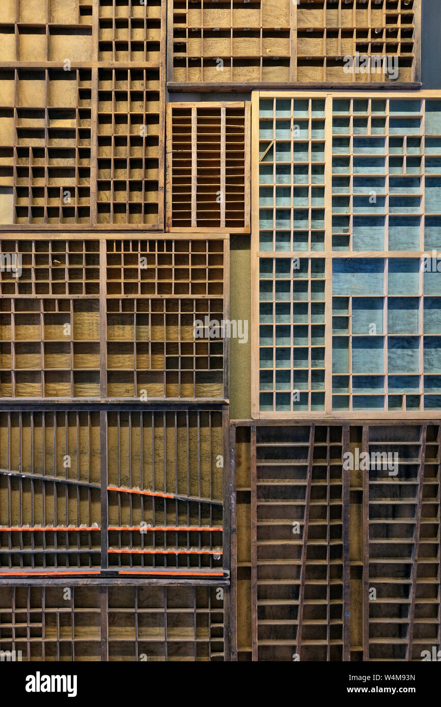 Set case. Close-up of old typesetting boxes on the facade of a paper ...