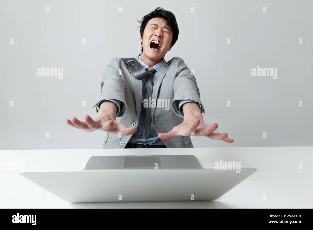 Expressions of shock business man Stock Photo - Alamy