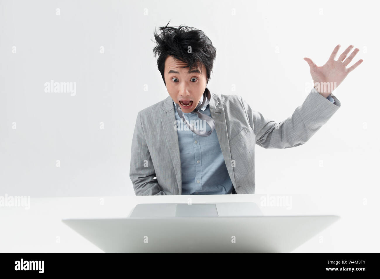 Expressions of shock business man Stock Photo - Alamy