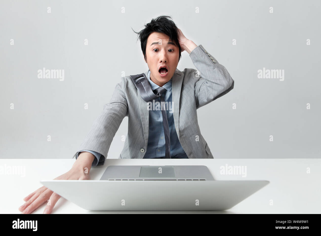 Expressions of shock business man Stock Photo - Alamy