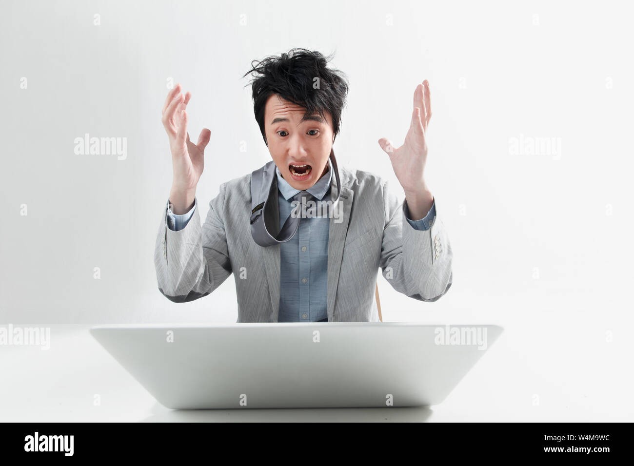 Expressions of shock business man Stock Photo - Alamy