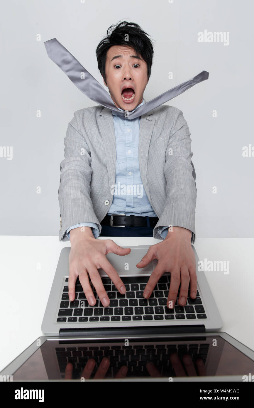 Expressions of shock business man Stock Photo - Alamy