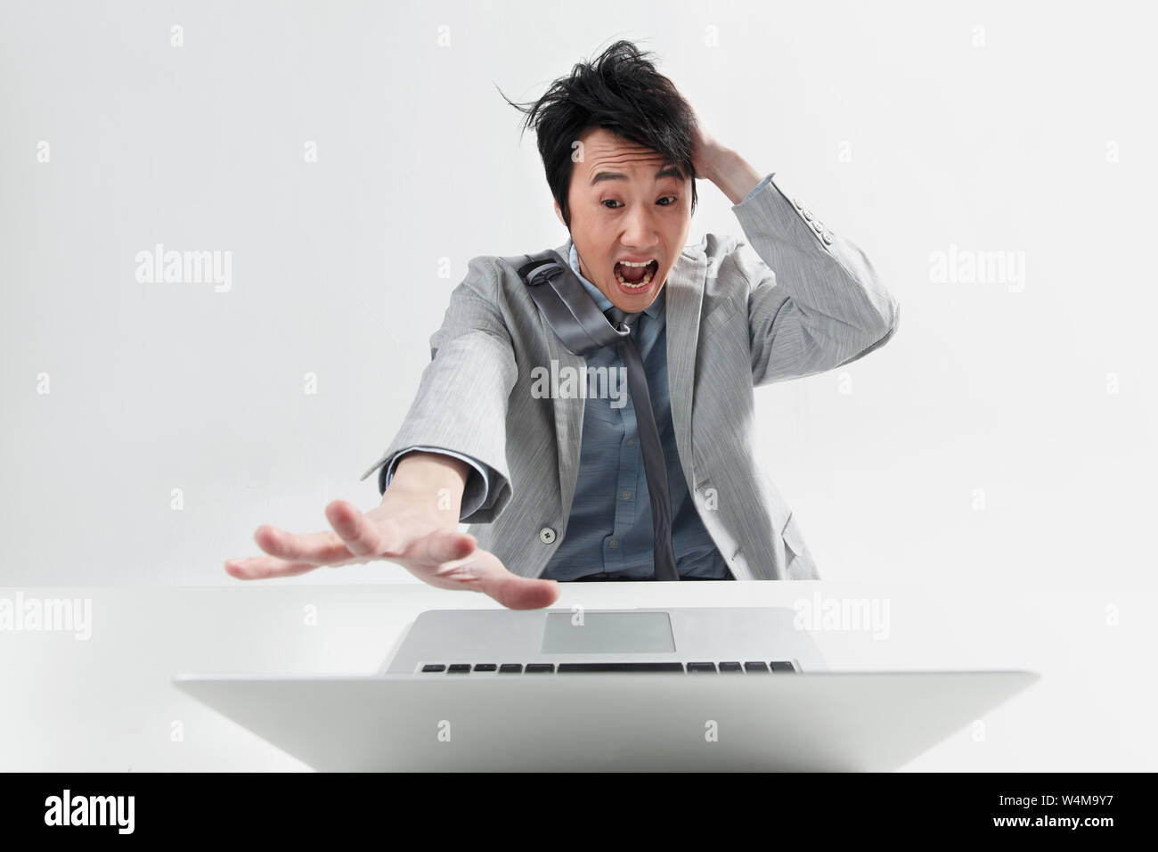 Expressions of shock business man Stock Photo - Alamy