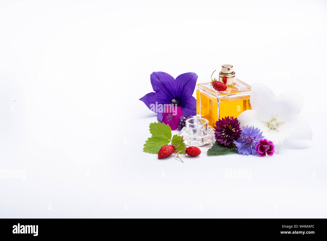 Creation of perfume essence, summer flowers sweet light fragrance ...