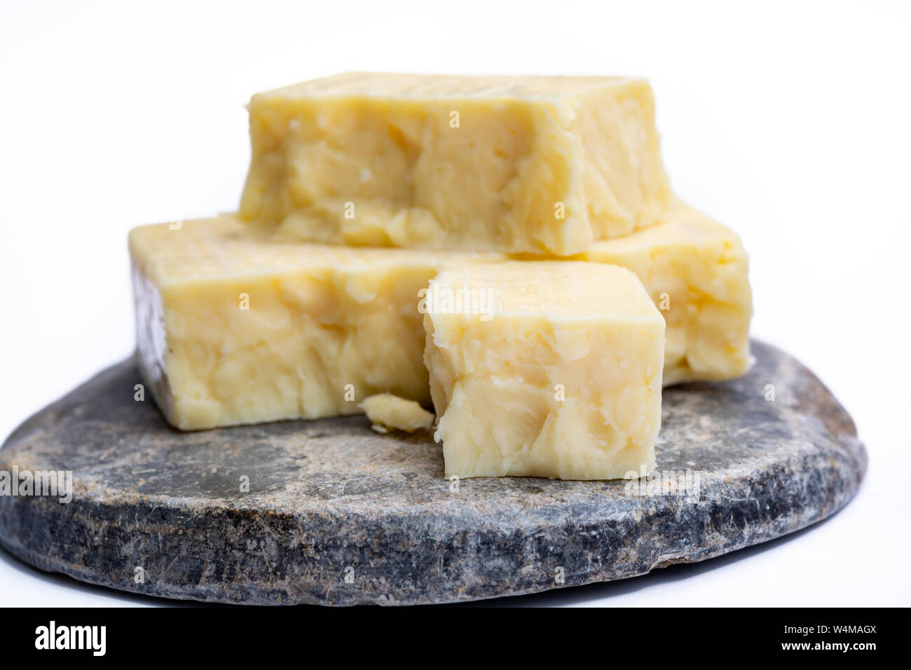 Cheddar cheese collection, block of Cheddar cheese made from cow milk ...