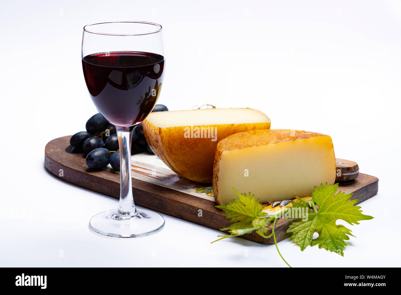 Hard Italian pecorino sheep cheese and glass with Italian red wine ...