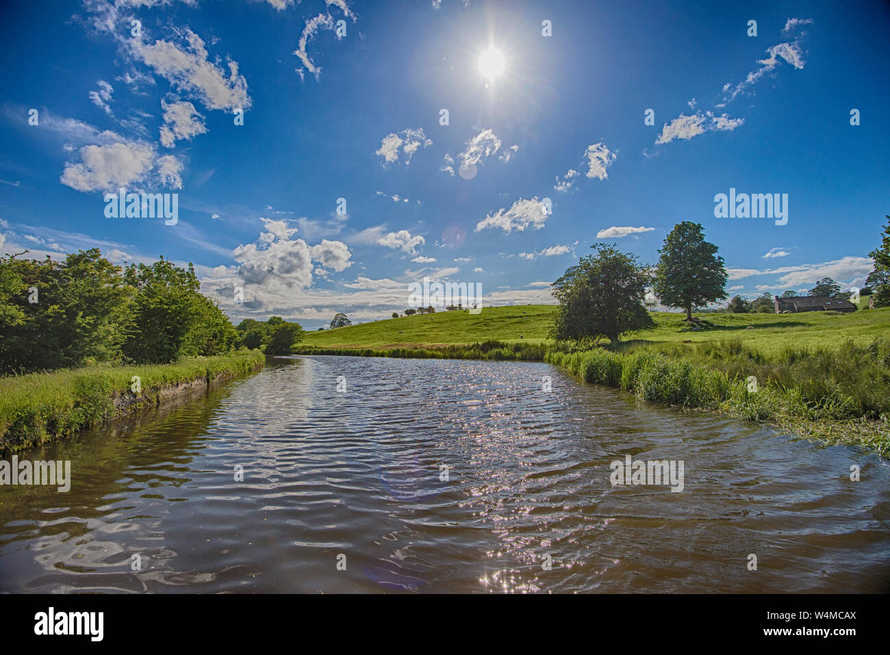 Landscape view of English rural countryside scenery on British waterway ...