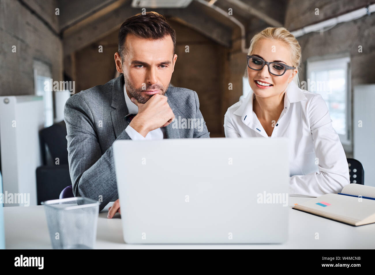 Business partners discussing together hi-res stock photography and ...