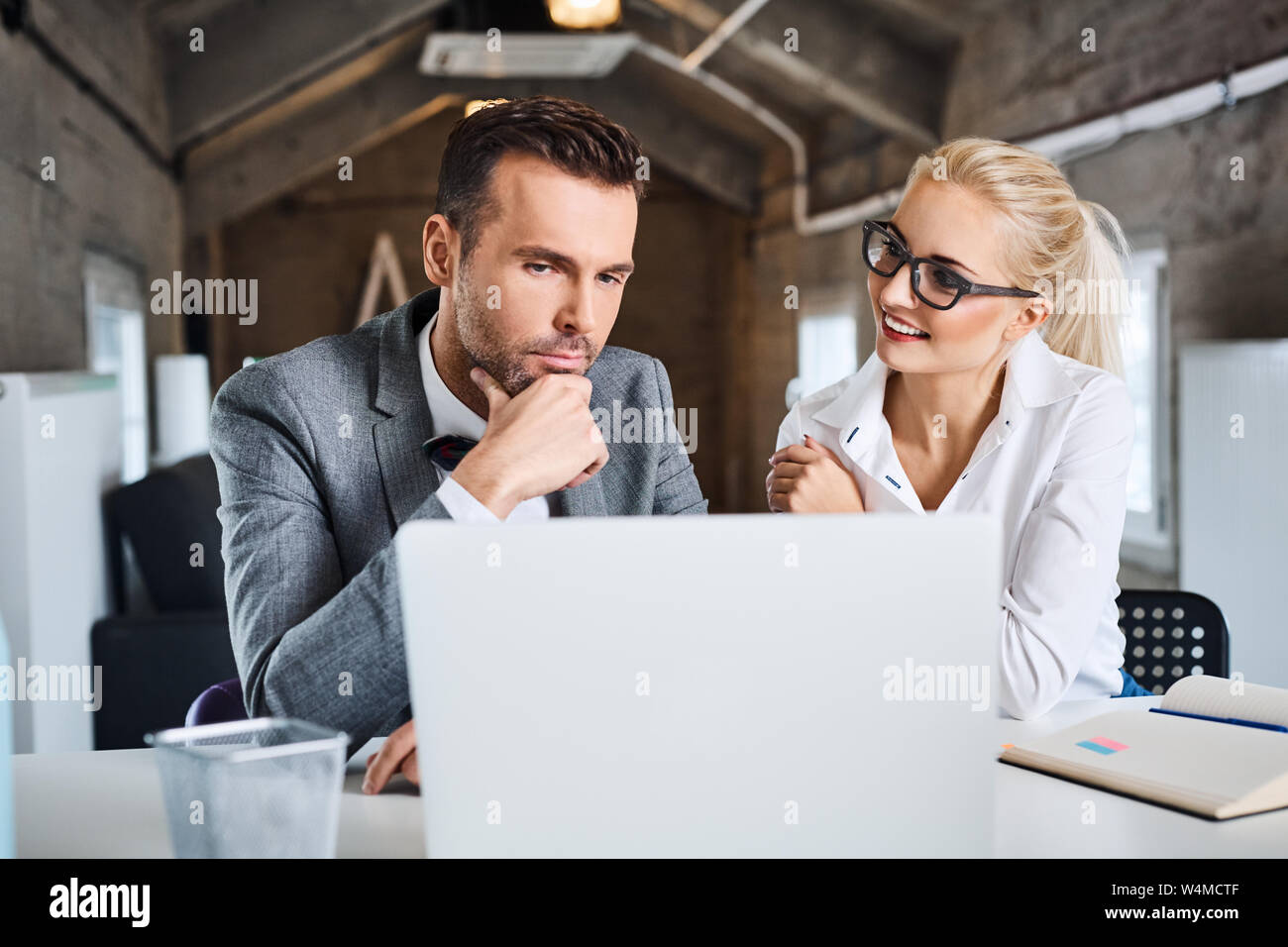 Business partners discussing together hi-res stock photography and ...