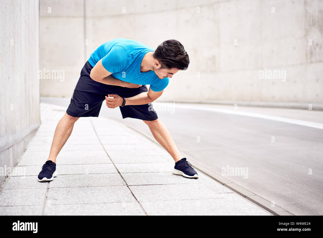 Bending forward hi-res stock photography and images - Alamy