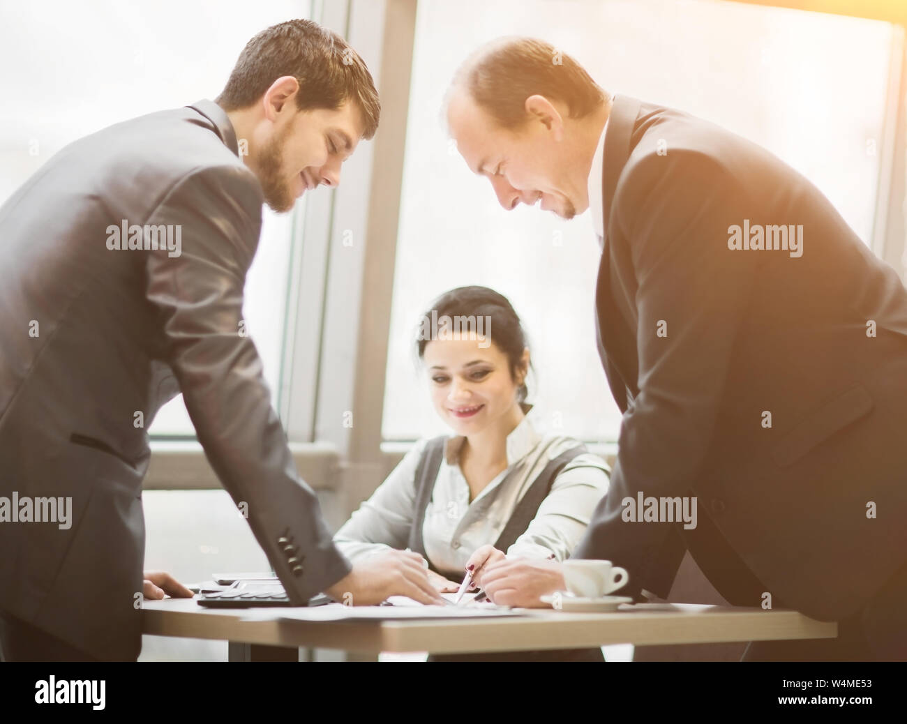 Business team working together to achieve better results Stock Photo ...