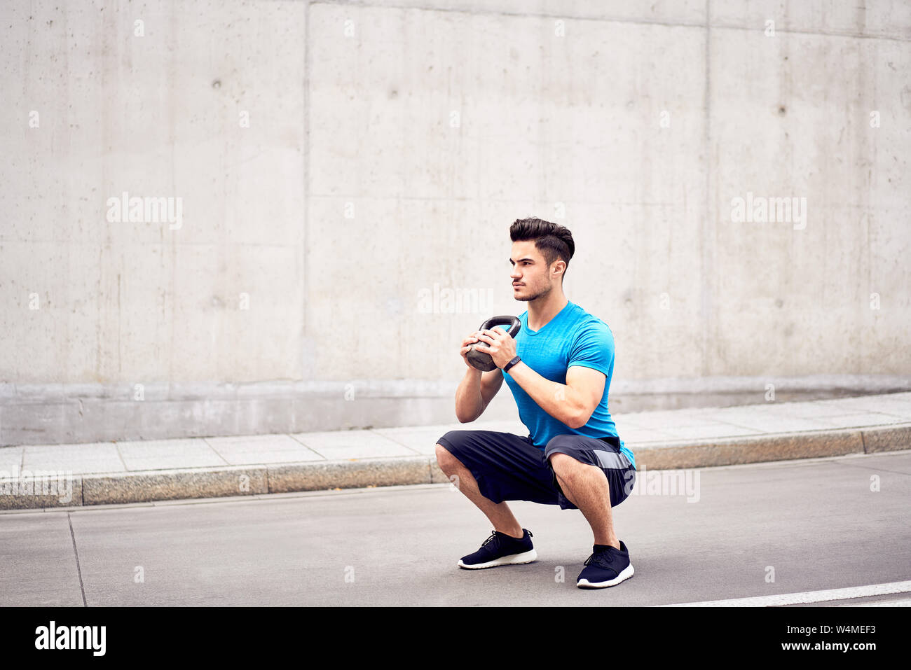 Squat Movement High Resolution Stock Photography and Images - Alamy