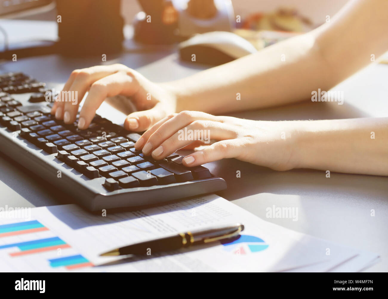 Close-up shot of a female learner typing on the keyboard Stock Photo ...