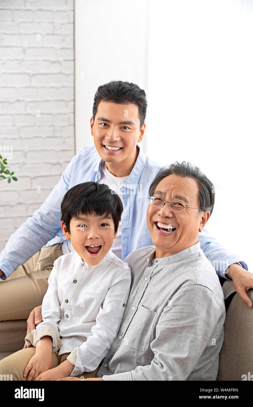 Three generations of a happiness Stock Photo - Alamy