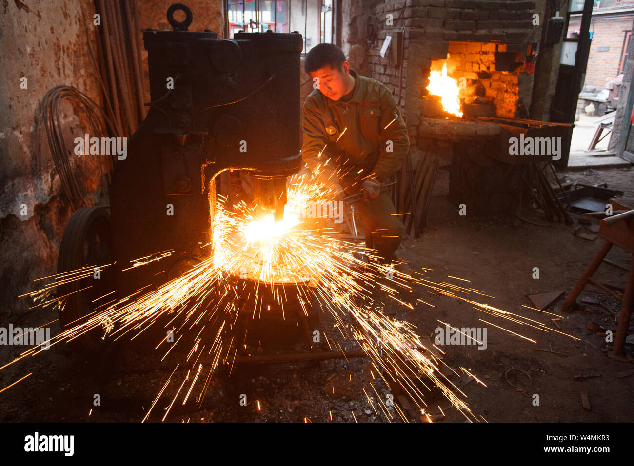 Chinese blacksmith hi-res stock photography and images - Alamy