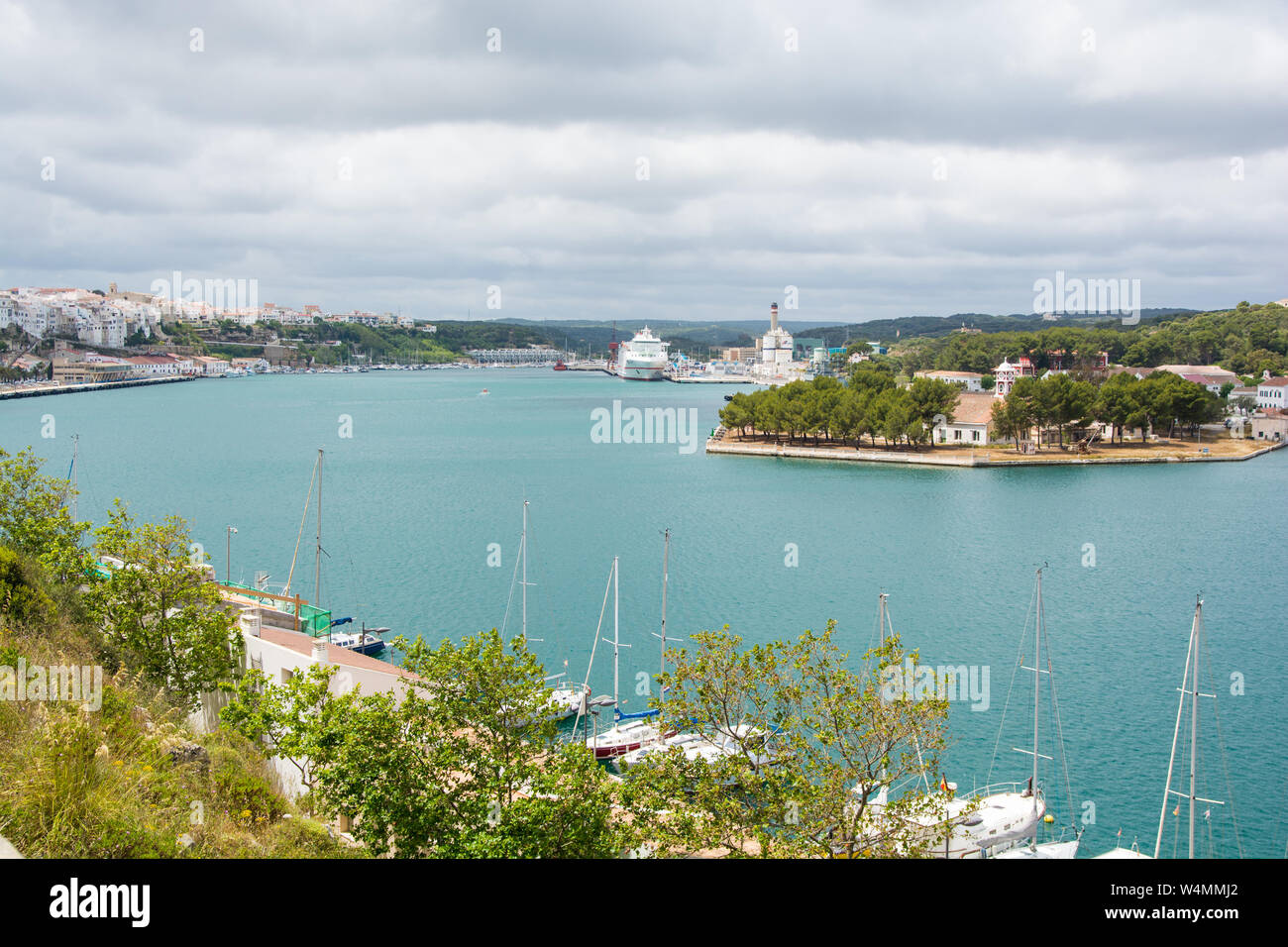 Port of Mahon with a ferry in the background Stock Photo - Alamy