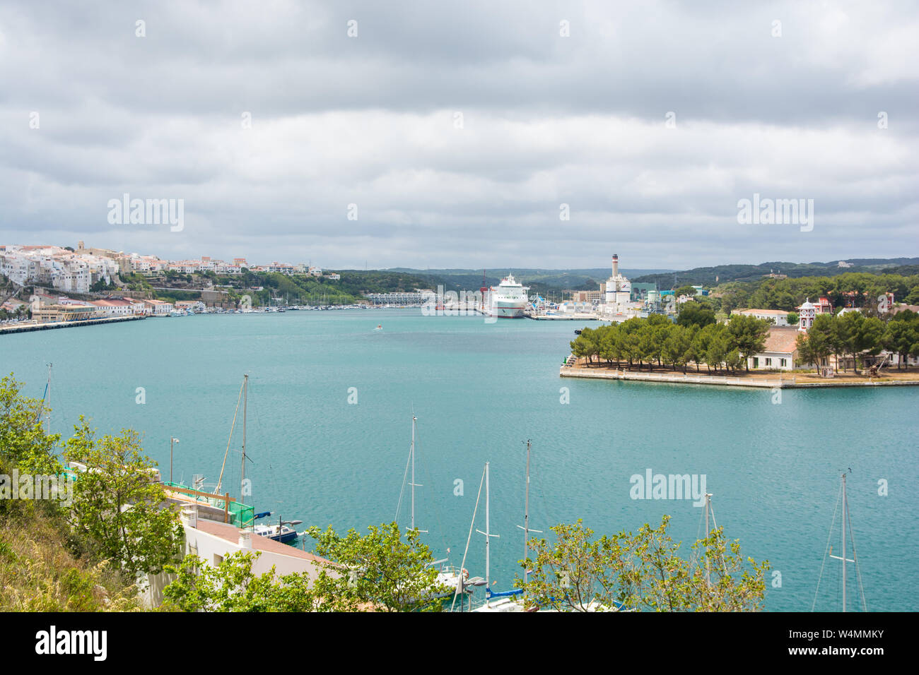 Port of Mahon with a ferry in the background Stock Photo - Alamy